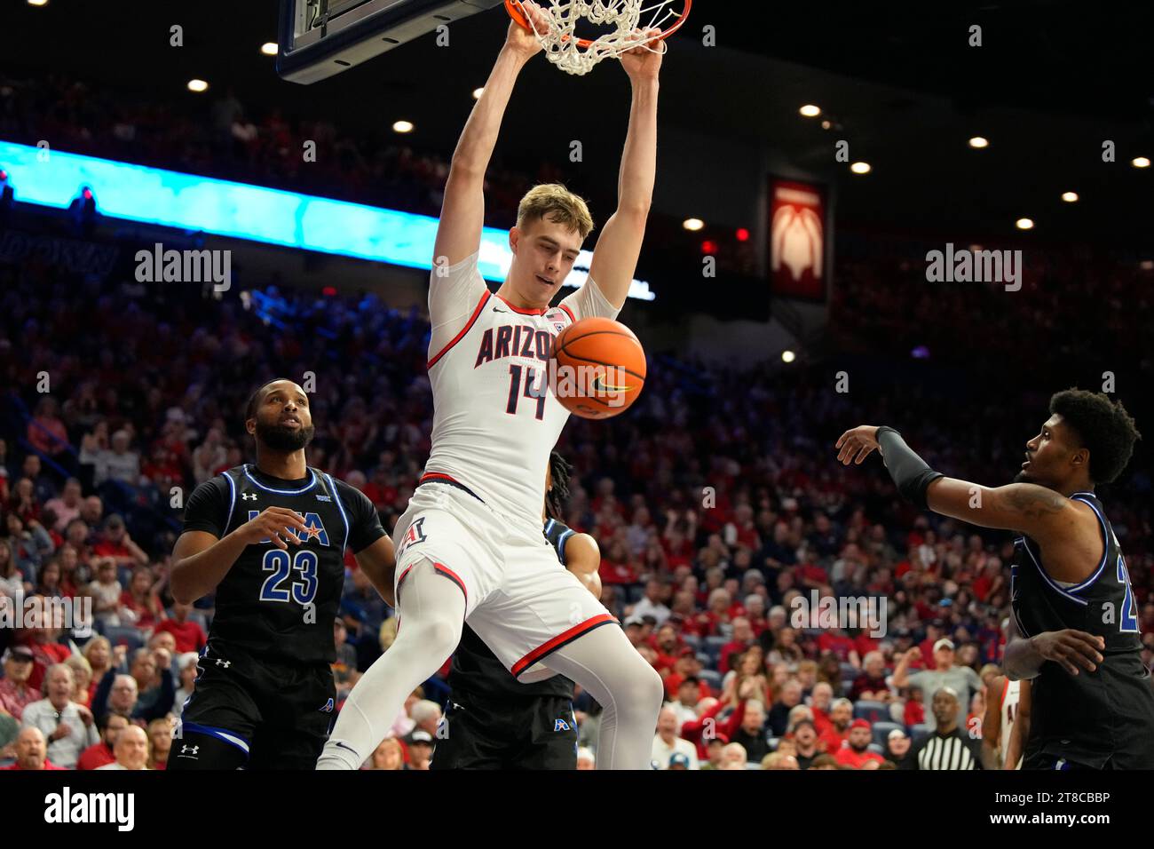 Arizona center Motiejus Krivas dunks over Texas-Arlington guard ...