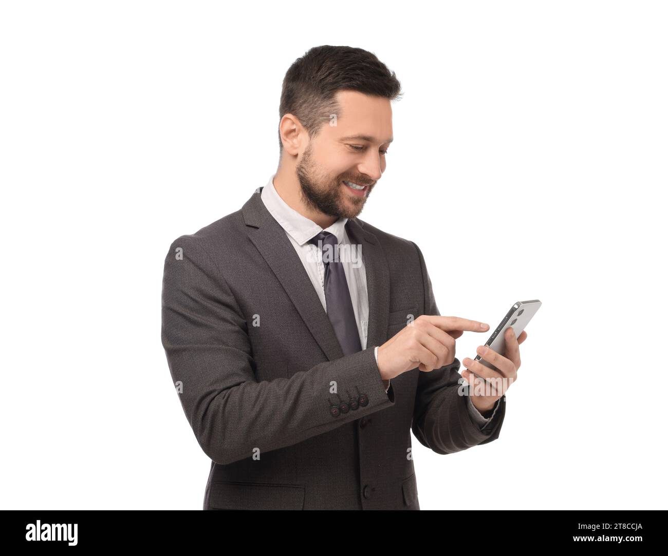 Happy man sending message via smartphone on white background Stock ...