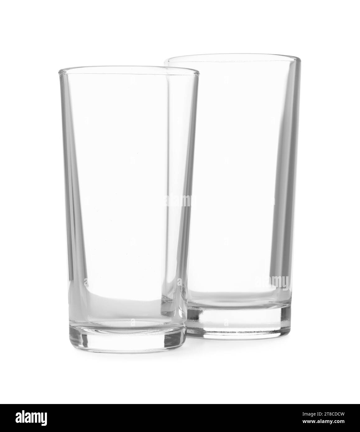 Two clean empty highball glasses isolated on white Stock Photo - Alamy