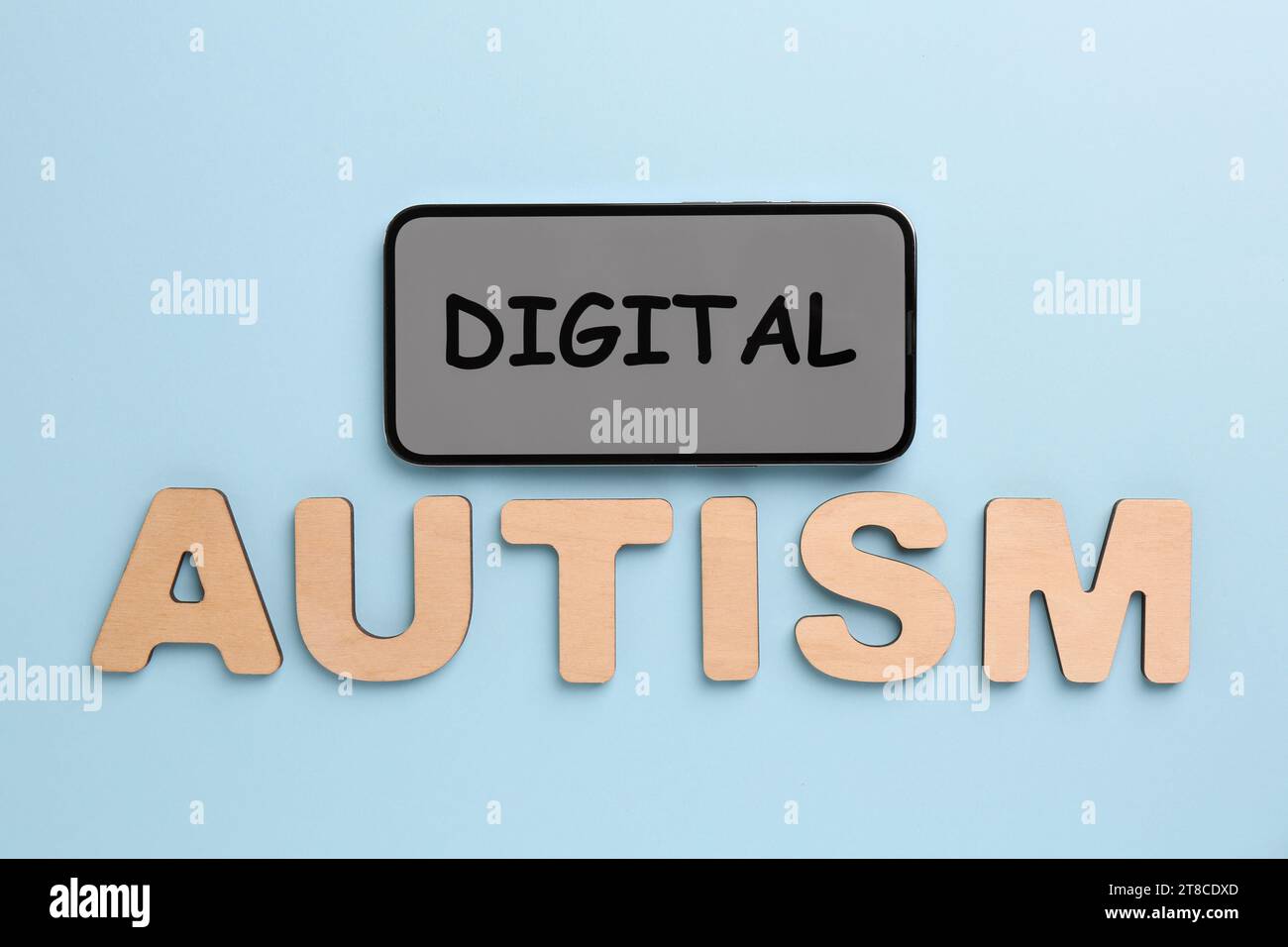 Phrase Digital Autism made of smartphone and wooden letters on light ...