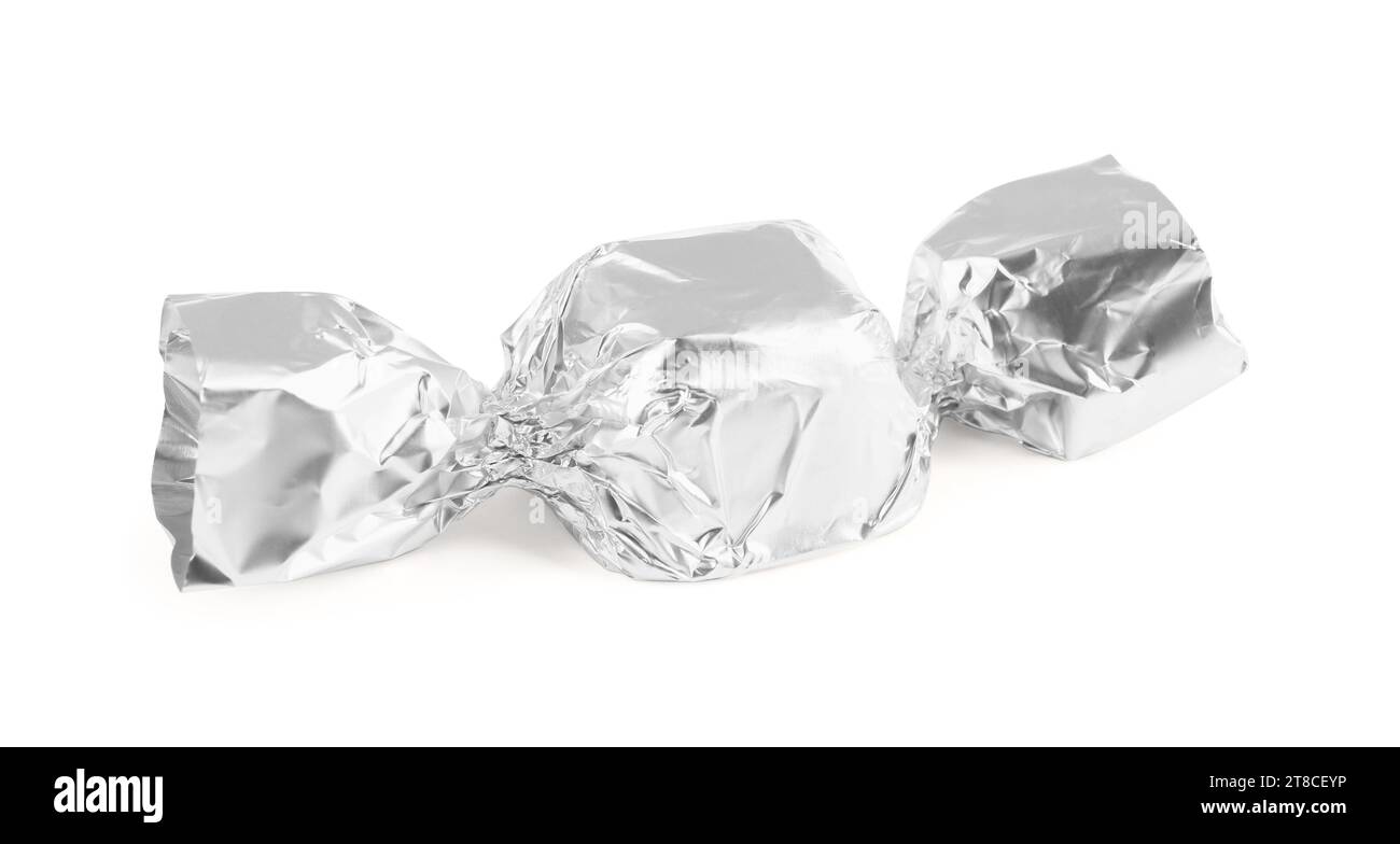 Tasty candy in silver wrapper isolated on white Stock Photo - Alamy