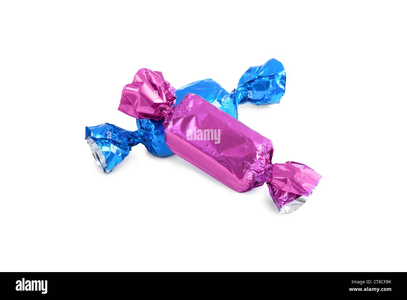 Two candies in colorful wrappers isolated on white Stock Photo - Alamy