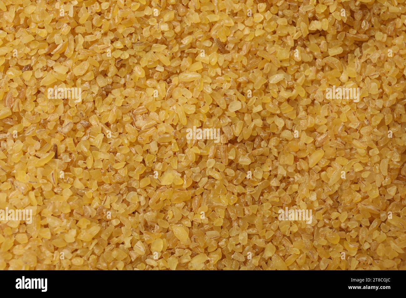 Pile of raw bulgur as background, top view Stock Photo - Alamy