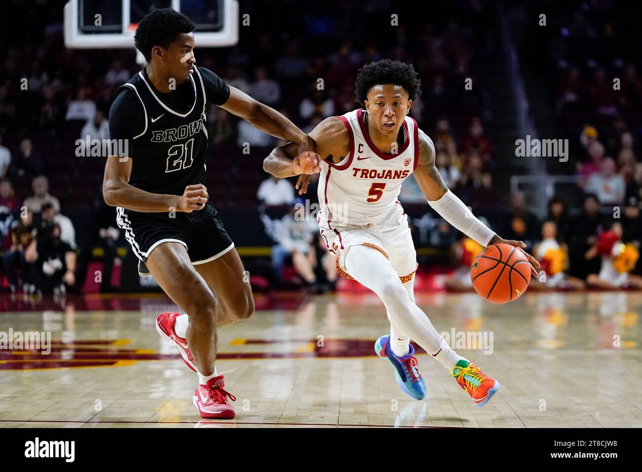 Southern California guard Boogie Ellis, right, drives against Brown ...