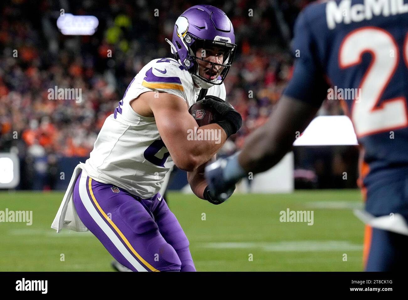 Minnesota Vikings tight end Josh Oliver scores a touchdown against the ...