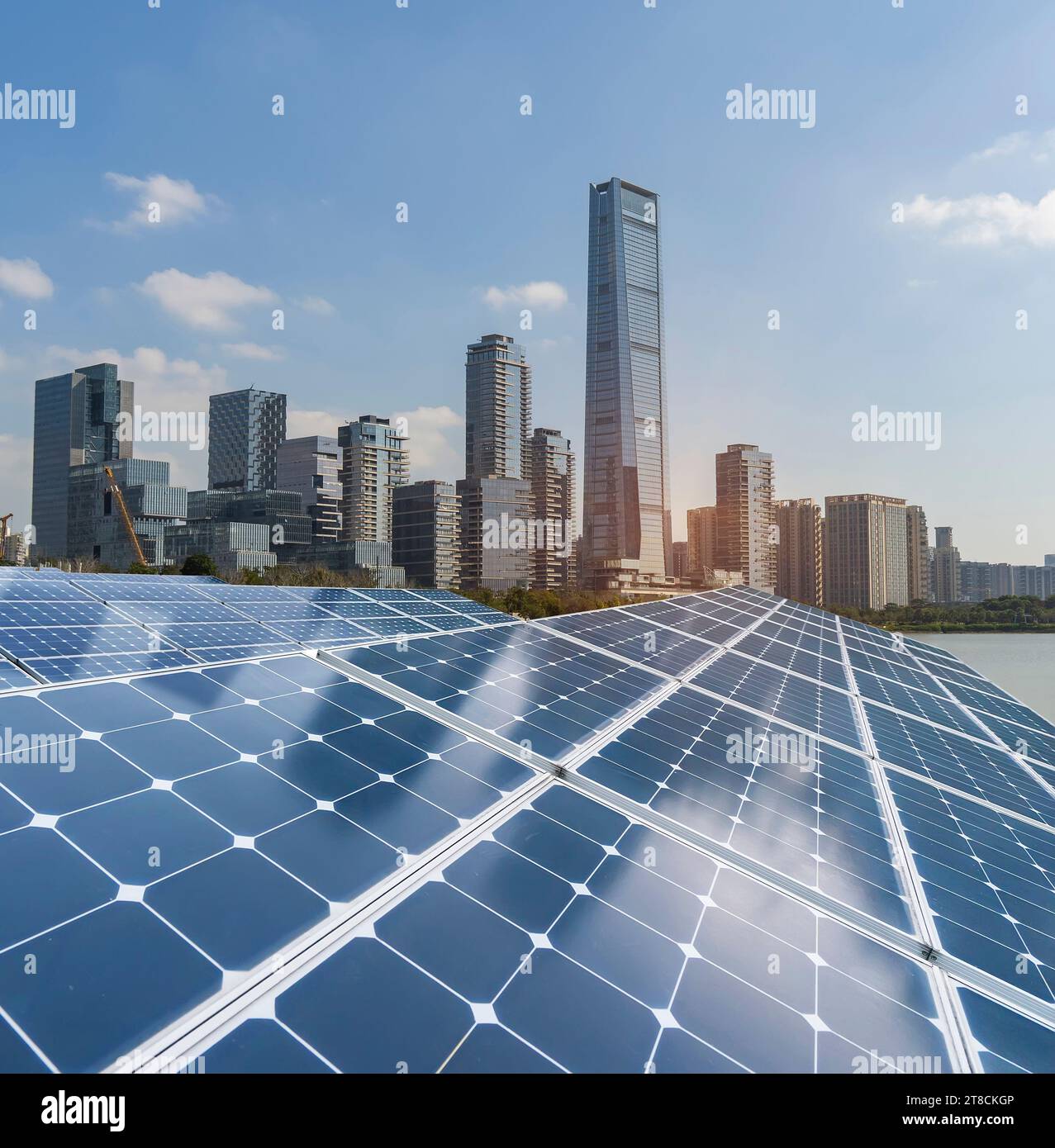 Ecological energy renewable solar panel plant with urban landscape ...