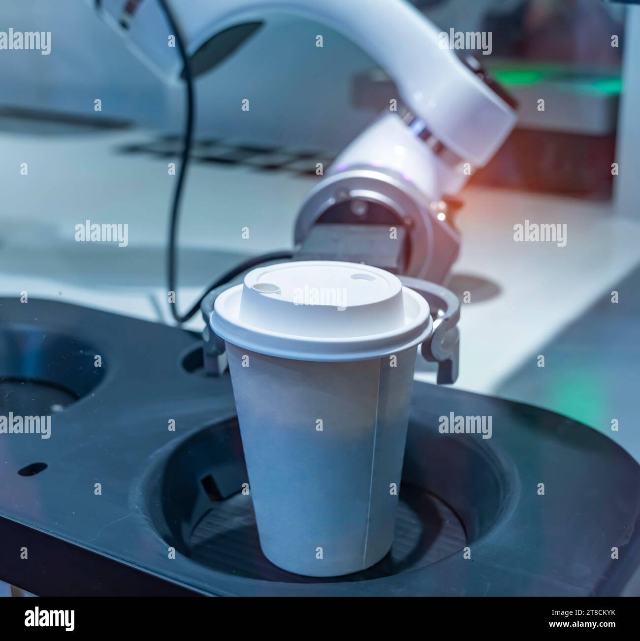 automatic robot arm preparing coffee with coffee machine Stock Photo ...