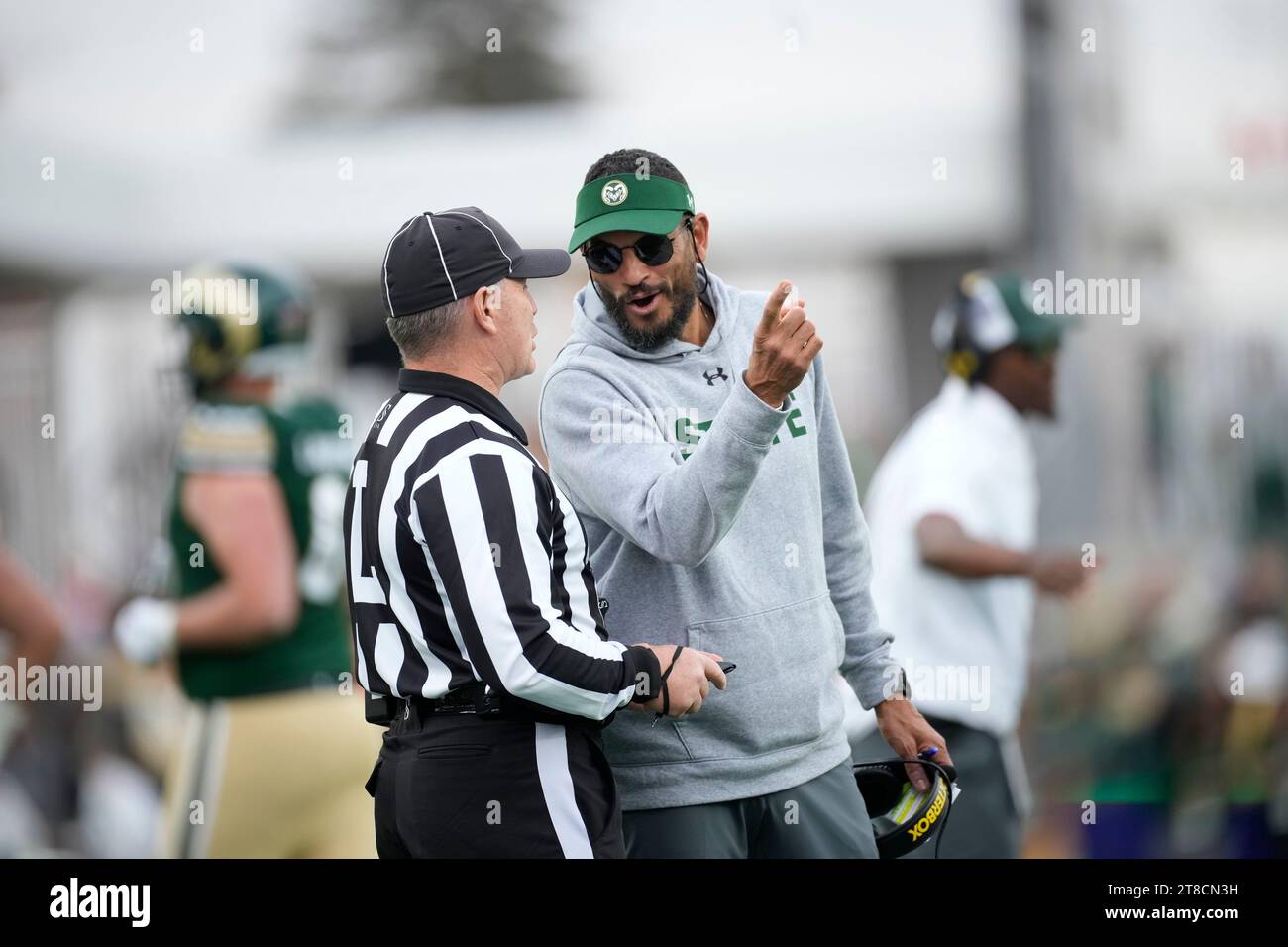 Colorado State head coach Jay Norvell chats with line judge in the ...