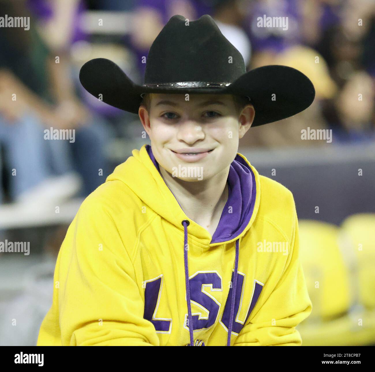 Baton Rouge, USA. 19th Nov, 2023. A young LSU Tigers fan wearing a ...