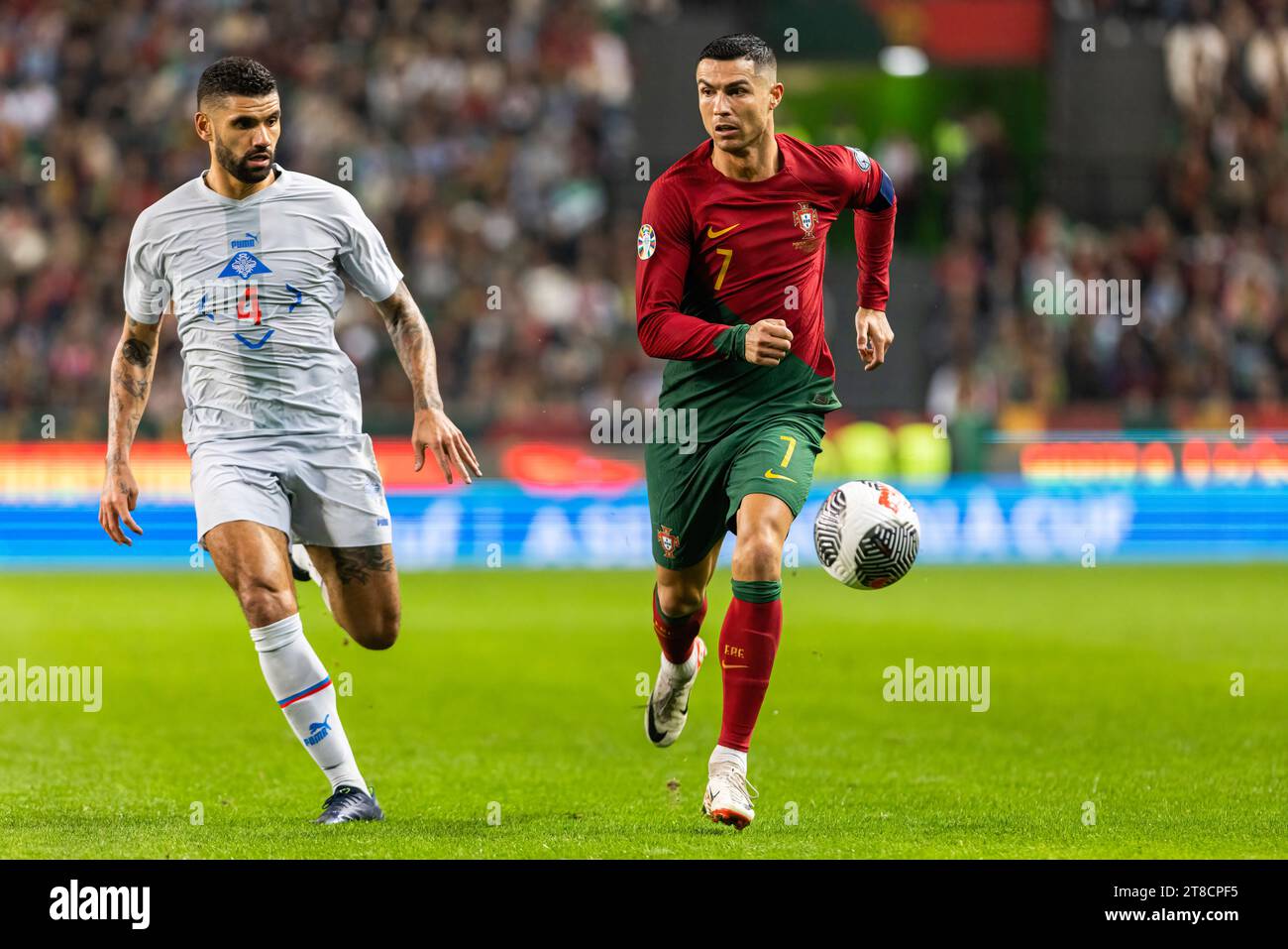Lisbon, Portugal. 19th Nov, 2023. Victor Palsson (L) of Iceland and ...