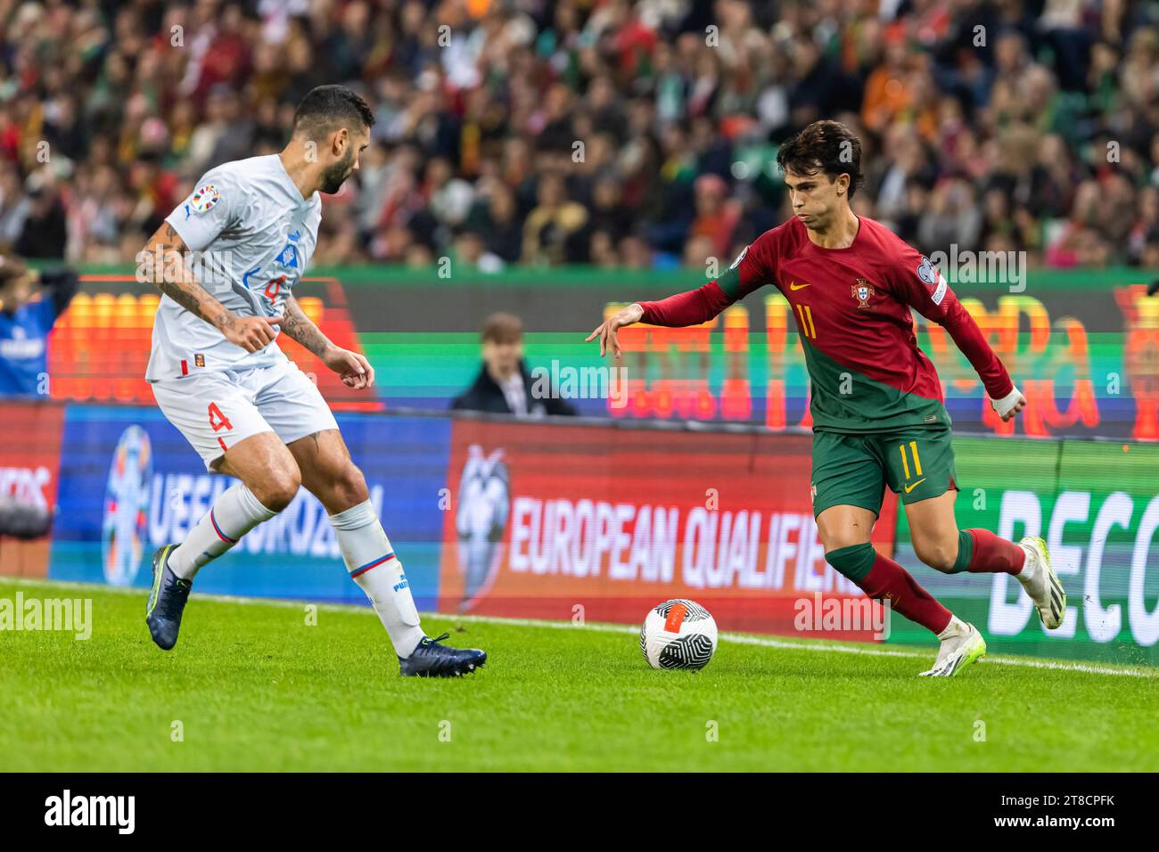 Lisbon, Portugal. 19th Nov, 2023. Victor Palsson (L) of Iceland and ...