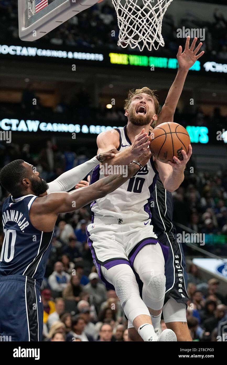 Sacramento Kings forward Domantas Sabonis (10) shoots against Dallas Mavericks forward Tim ...