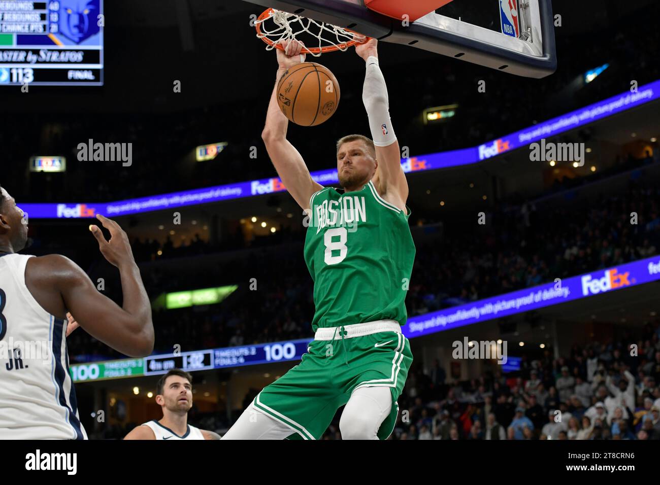 Boston Celtics center Kristaps Porzingis (8) dunks against the Memphis ...