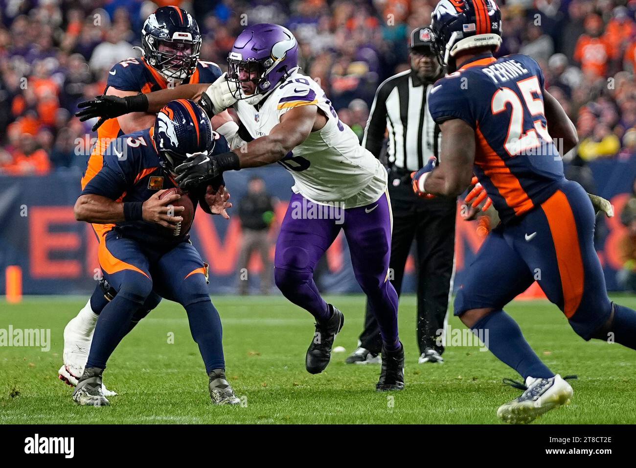 Denver Broncos quarterback Russell Wilson (3) is sacked by Minnesota ...