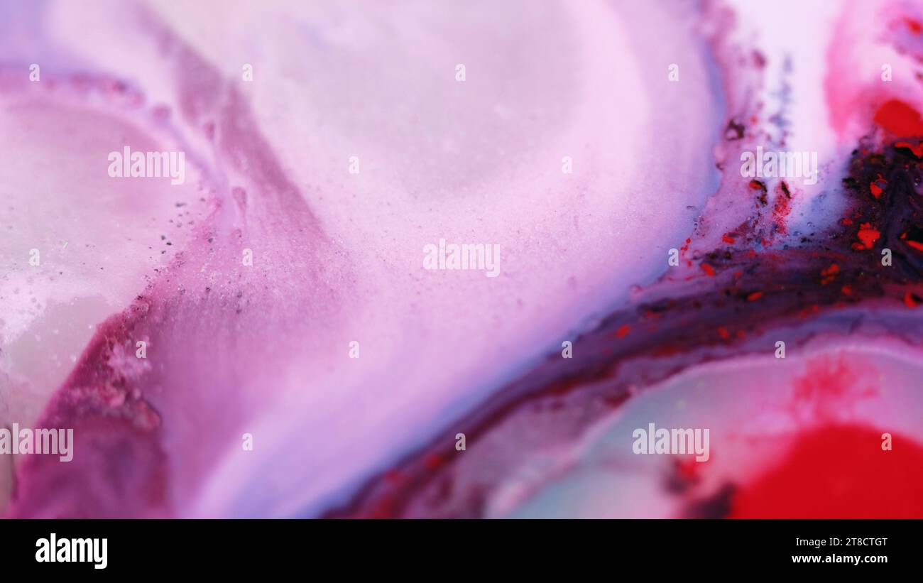 Ink fluid glitter water defocused hi-res stock photography and images ...