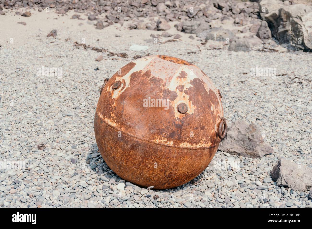 Old rusty sea mine on the beach Stock Photo - Alamy