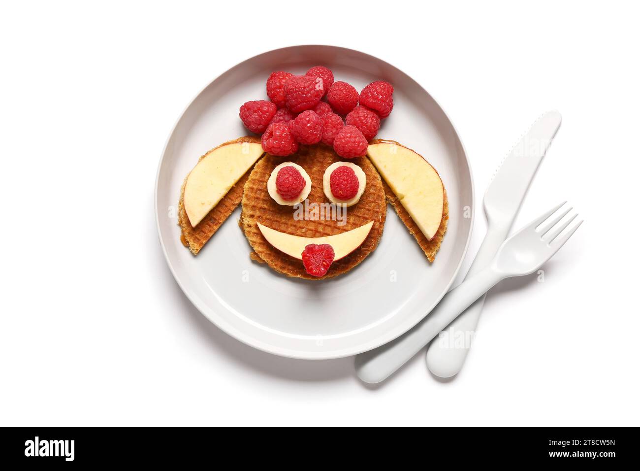 Plate with creative children's breakfast in shape of funny face on ...