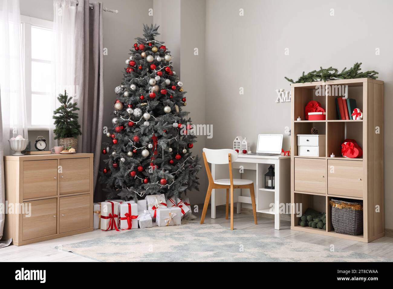 Interior of office with workplace, Christmas tree and presents Stock ...