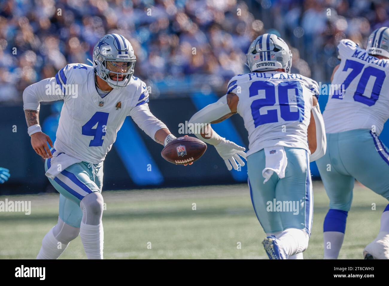 Charlotte, NC USA: Dallas Cowboys quarterback Dak Prescott (4) hands ...