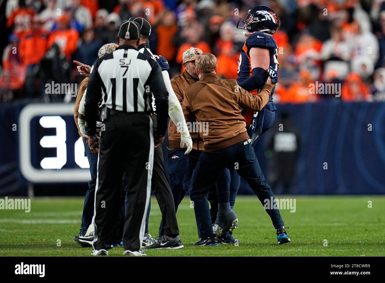 Denver Broncos defensive end Zach Allen (99) gets up after an injury ...