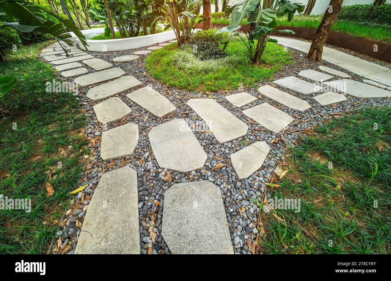 rock path leading through a garden Stock Photo - Alamy