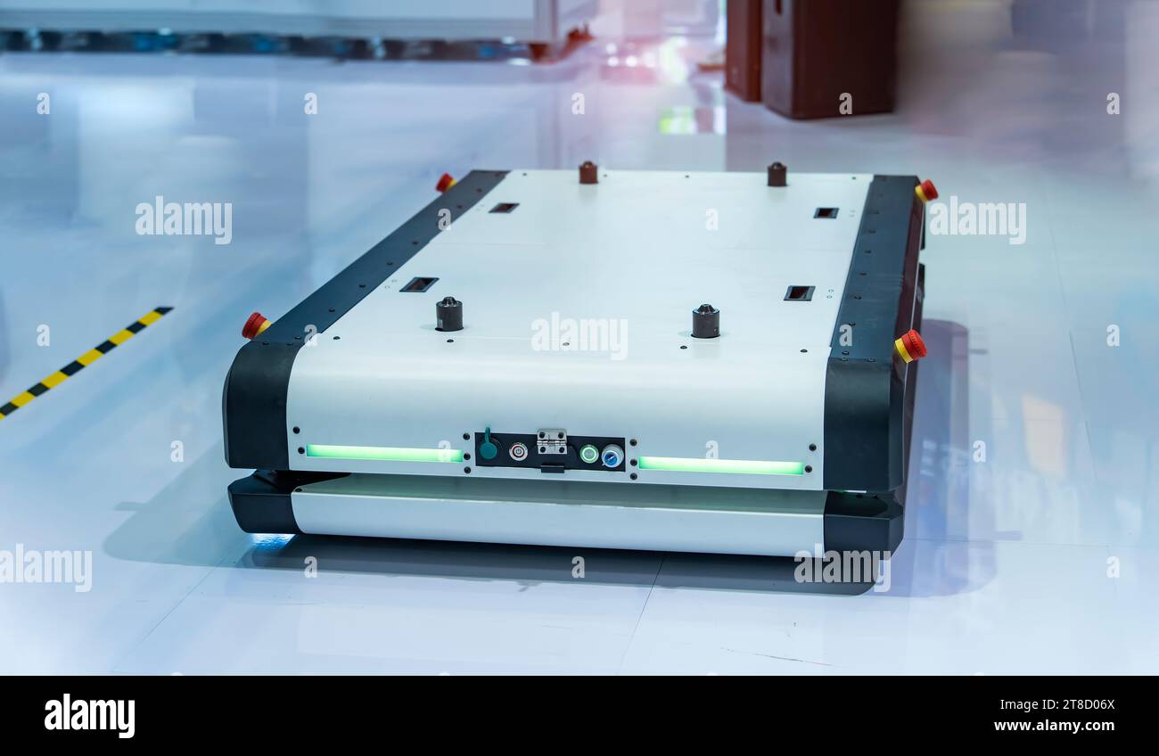 warehouse robot car carries cardboard box assembly in factory Stock ...