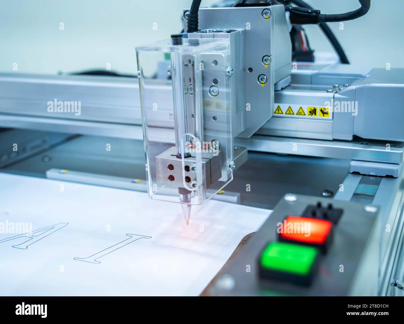 Robot hand with pen draws AI drawings on white paper Stock Photo - Alamy
