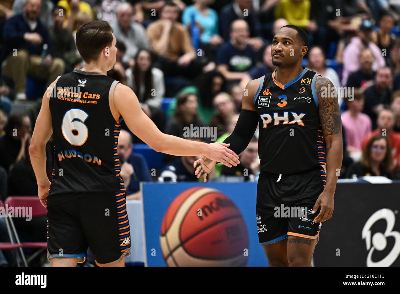 LaQuincy Rideau of Cheshire Phoenix and Jack Hudson of Cheshire Phoenix hi fiveduring the ...