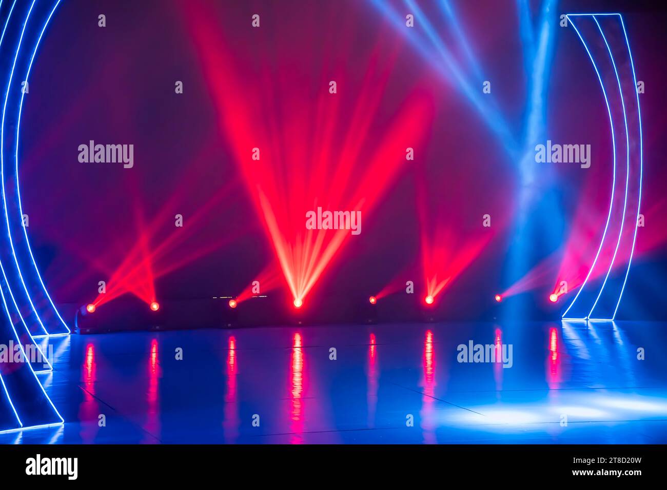 Professional lighting equipment lies on the floor of the stage in the ...