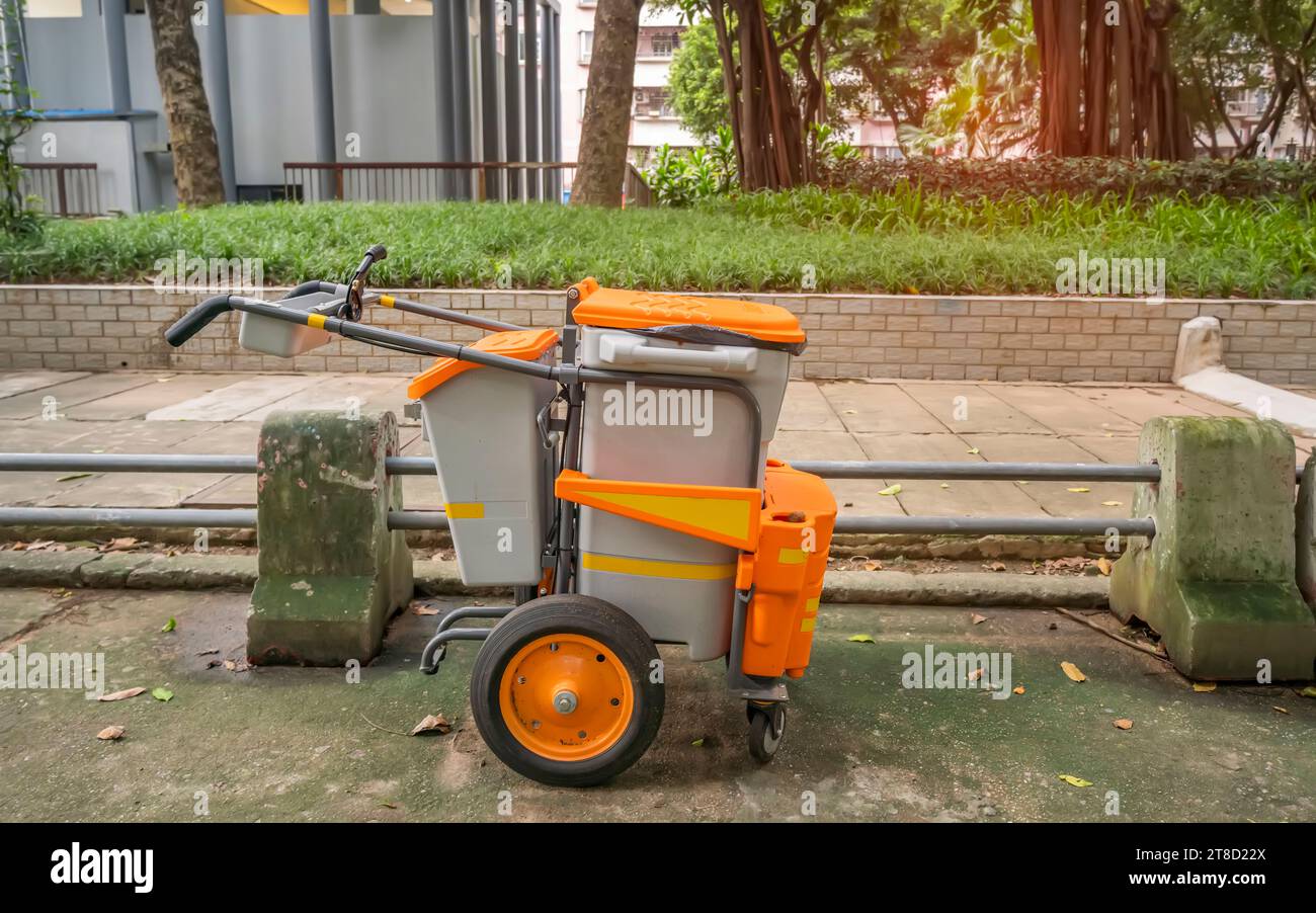 Cleaner cart in a public place with cleaning products Stock Photo - Alamy