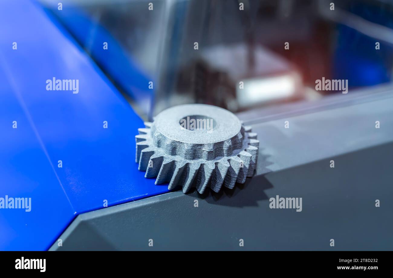 3D printer printing gear cog figure close-up Stock Photo - Alamy