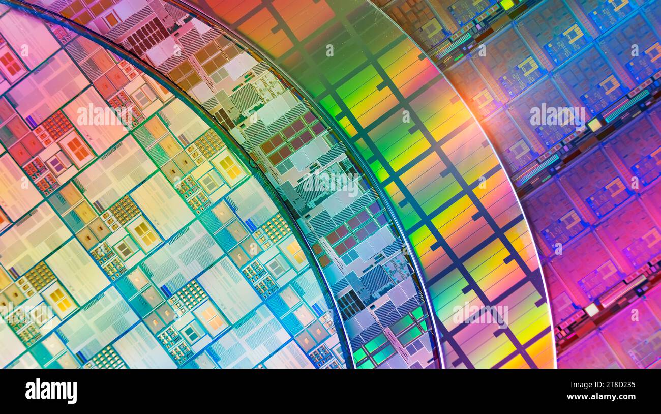 Silicon Wafers with microchips used in electronics for the fabrication ...
