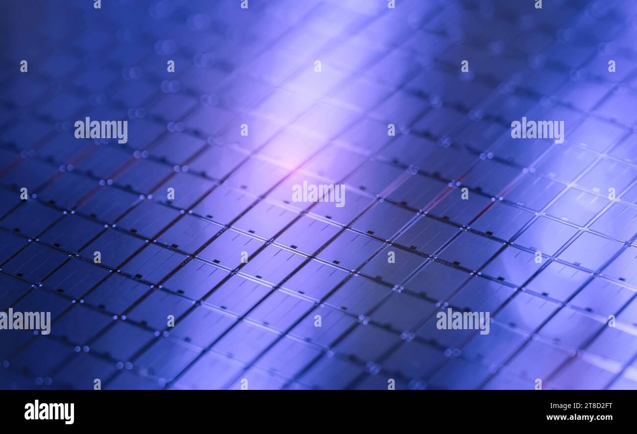 silicon chip wafer reflecting blue colors background Stock Photo - Alamy