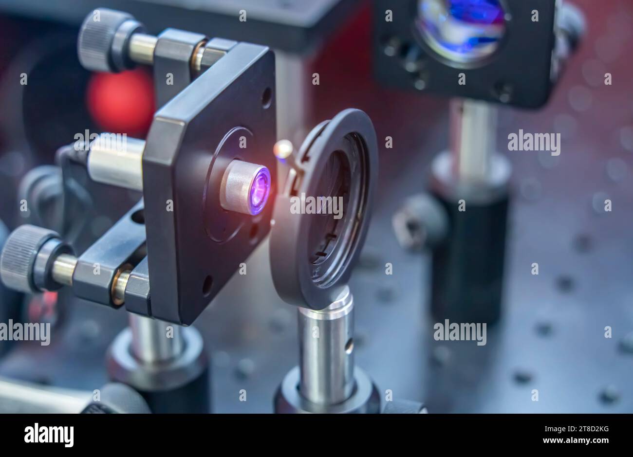 Experiment with laser device in optical laboratory Stock Photo - Alamy