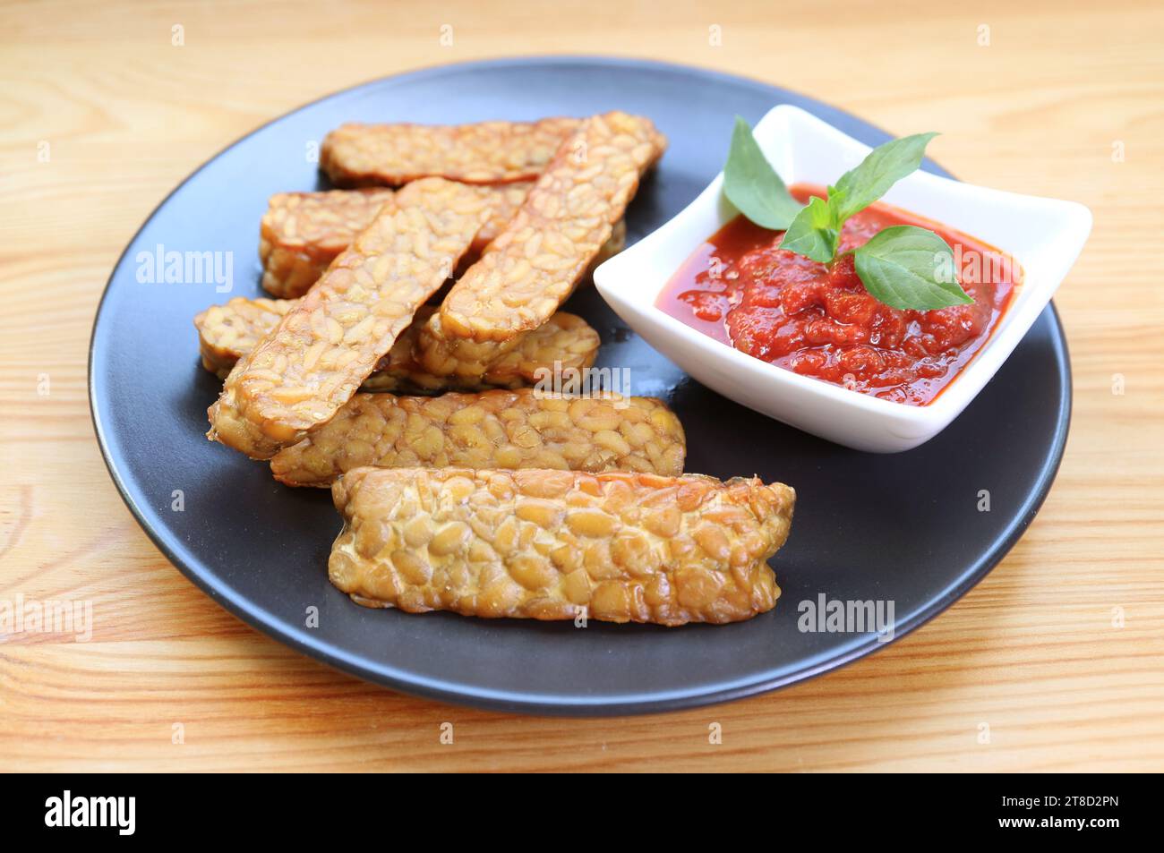 Delectable Pan fried Tempeh with marinara sauce, an easy dish of whole ...