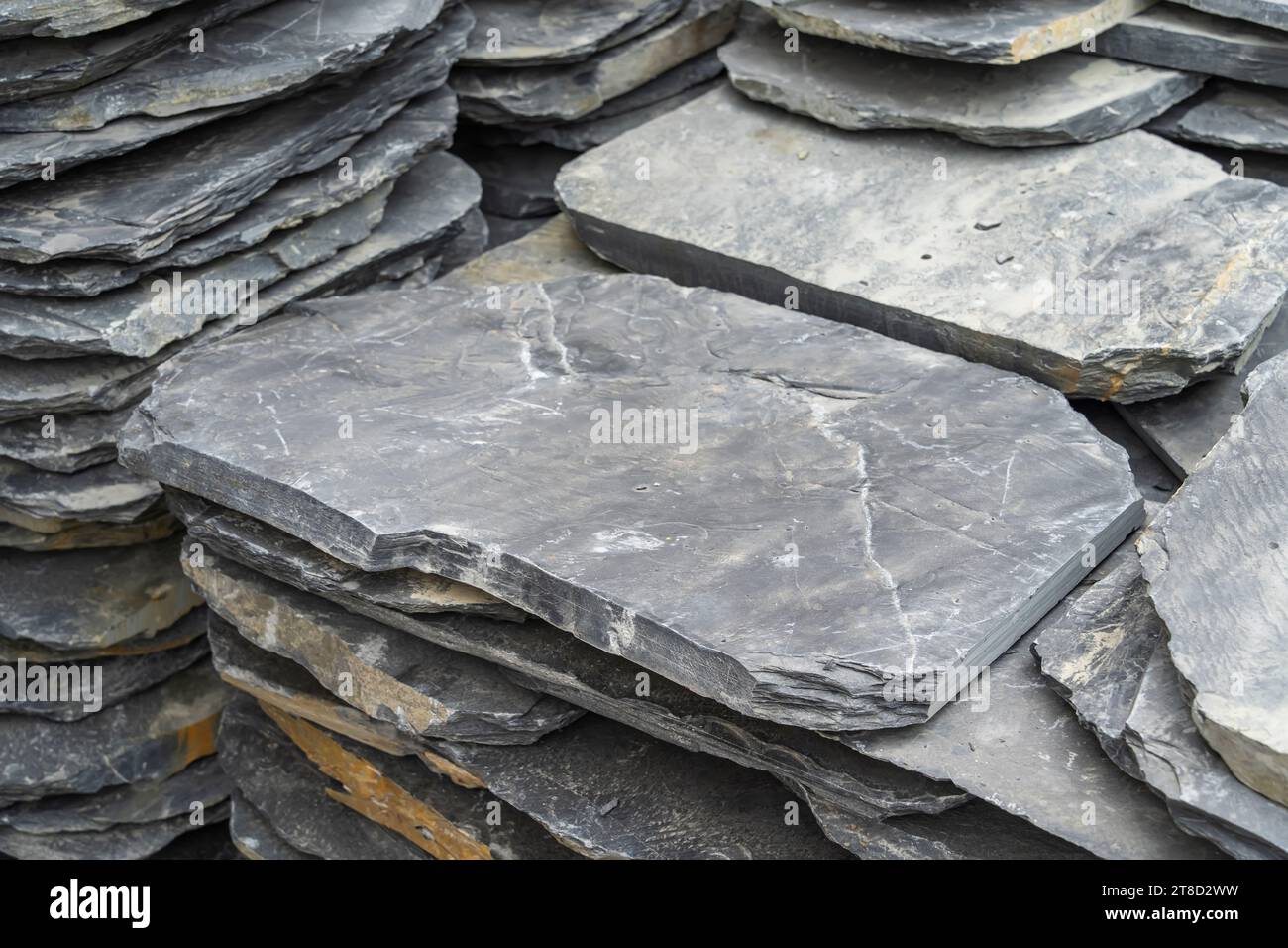 Stack flat slate stones cladding of wall used for flooring, walkways or ...