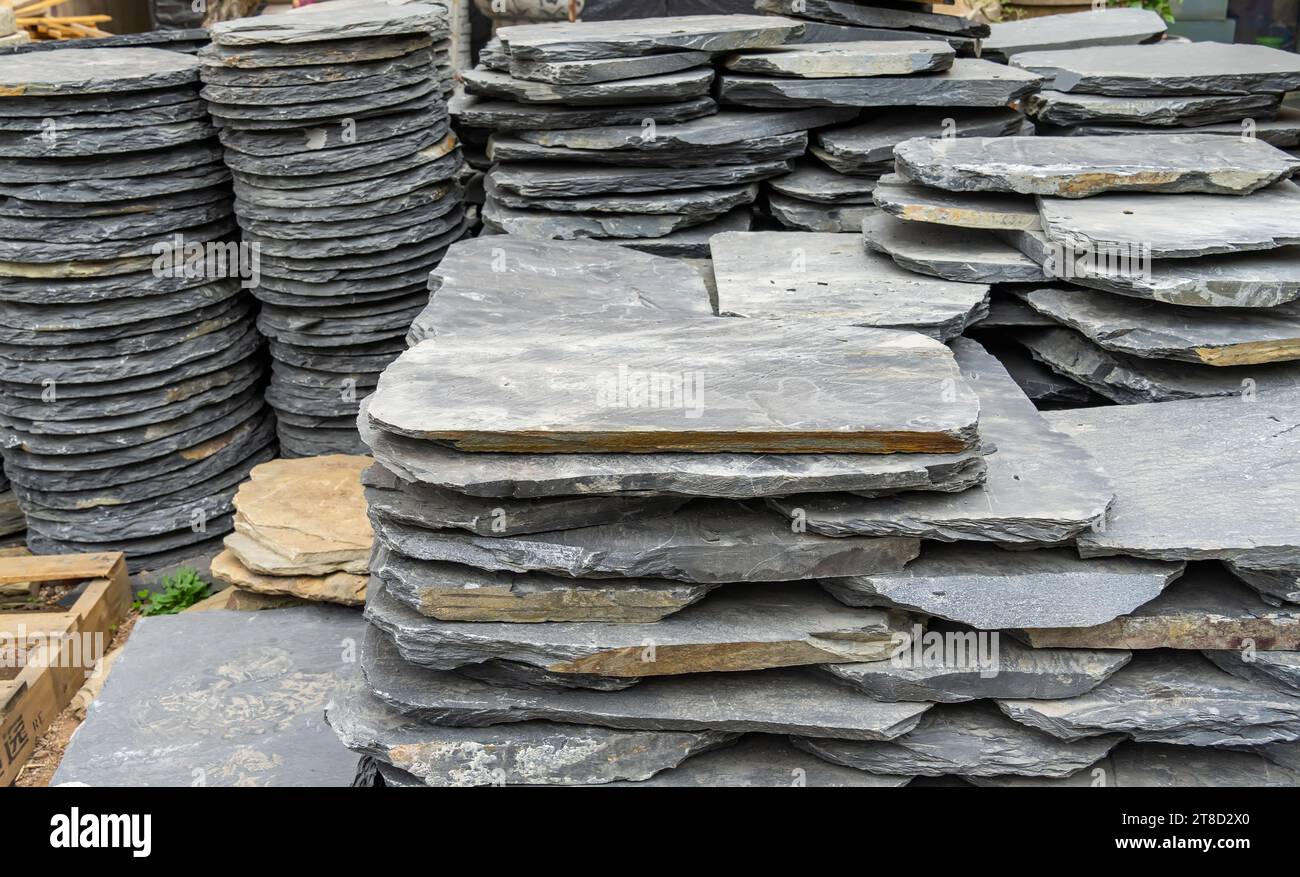 Stack flat slate stones cladding of wall used for flooring, walkways or ...