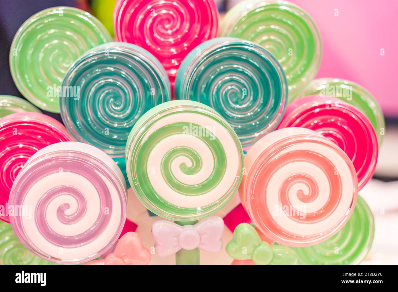 Colorful lollipop in plastic packaging box Stock Photo - Alamy