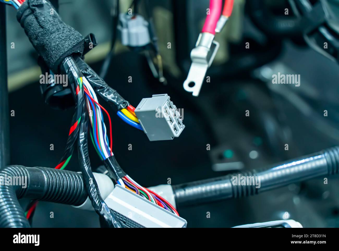 Large wide cable with wires and connectors and terminals in the wiring ...