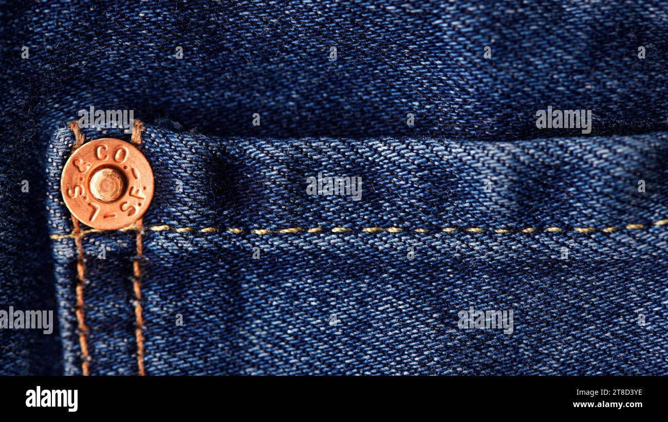 Close up of details of new LEVI'S 501 Jeans. Buttons and seams and ...