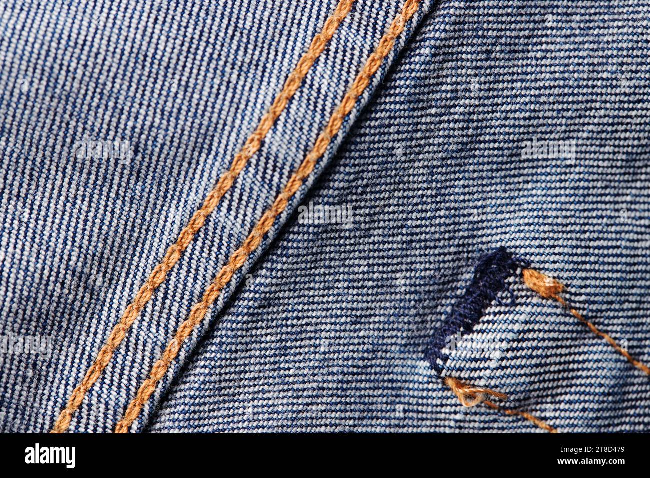 Seams on jeans close-up in high-resolution. Stitching on denim on the ...