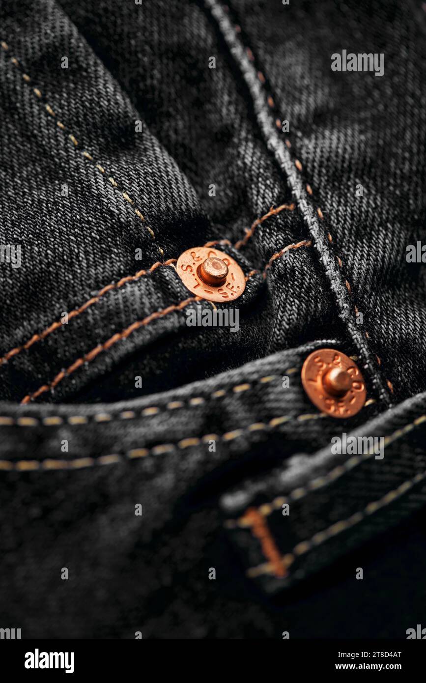 Close up of details of new LEVI'S 501 Jeans. Buttons and seams and ...