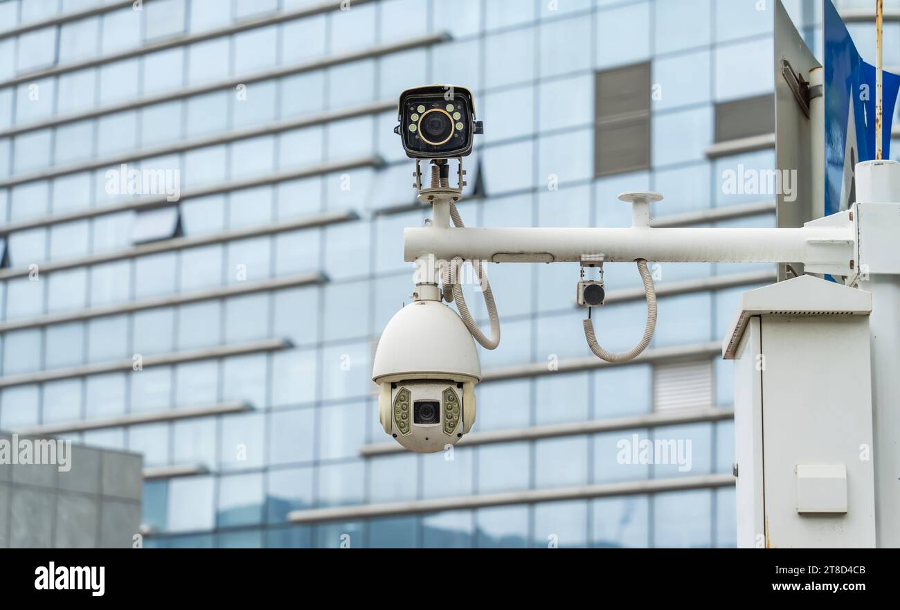 CCTV surveillance camera on building window Stock Photo - Alamy