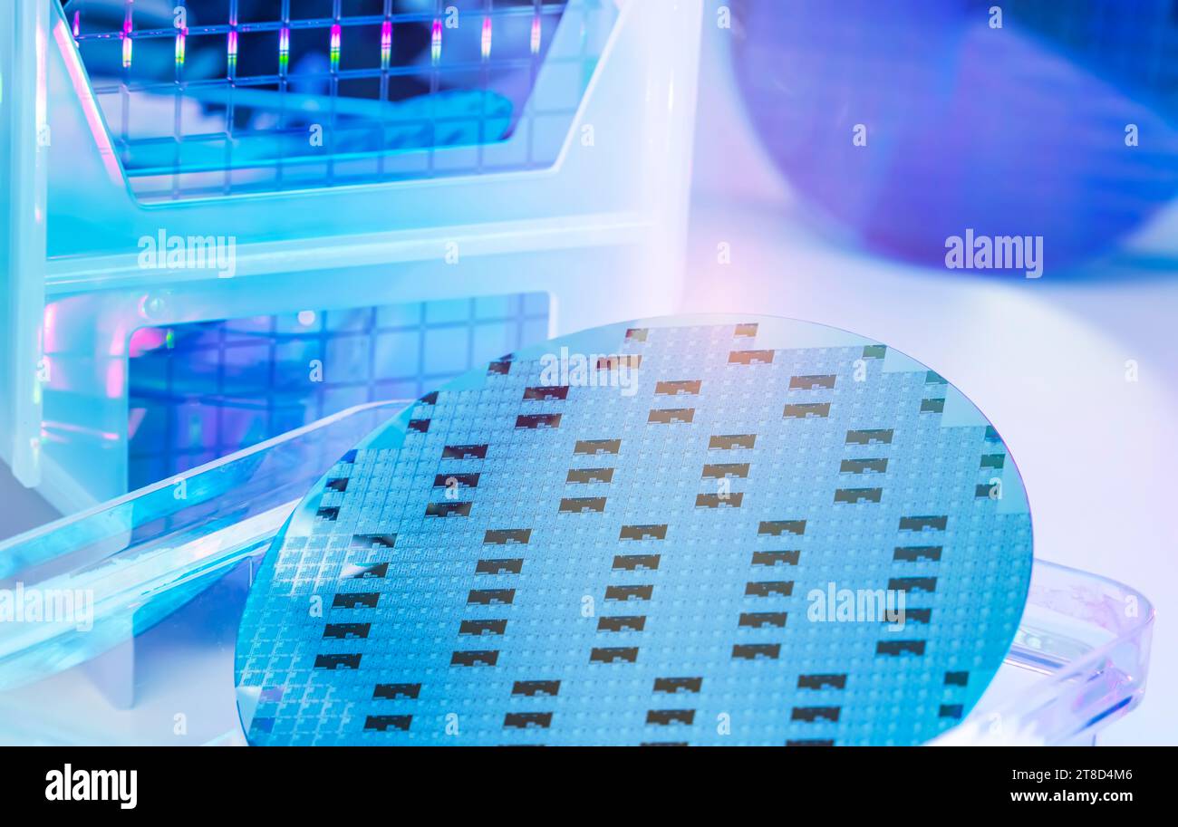 Silicon Wafer Under Cleanroom Fabrication in plastic holder box Stock ...