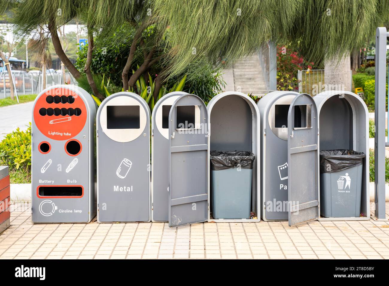 metal trash cans on a city street for sorting garbage.Ecological ...