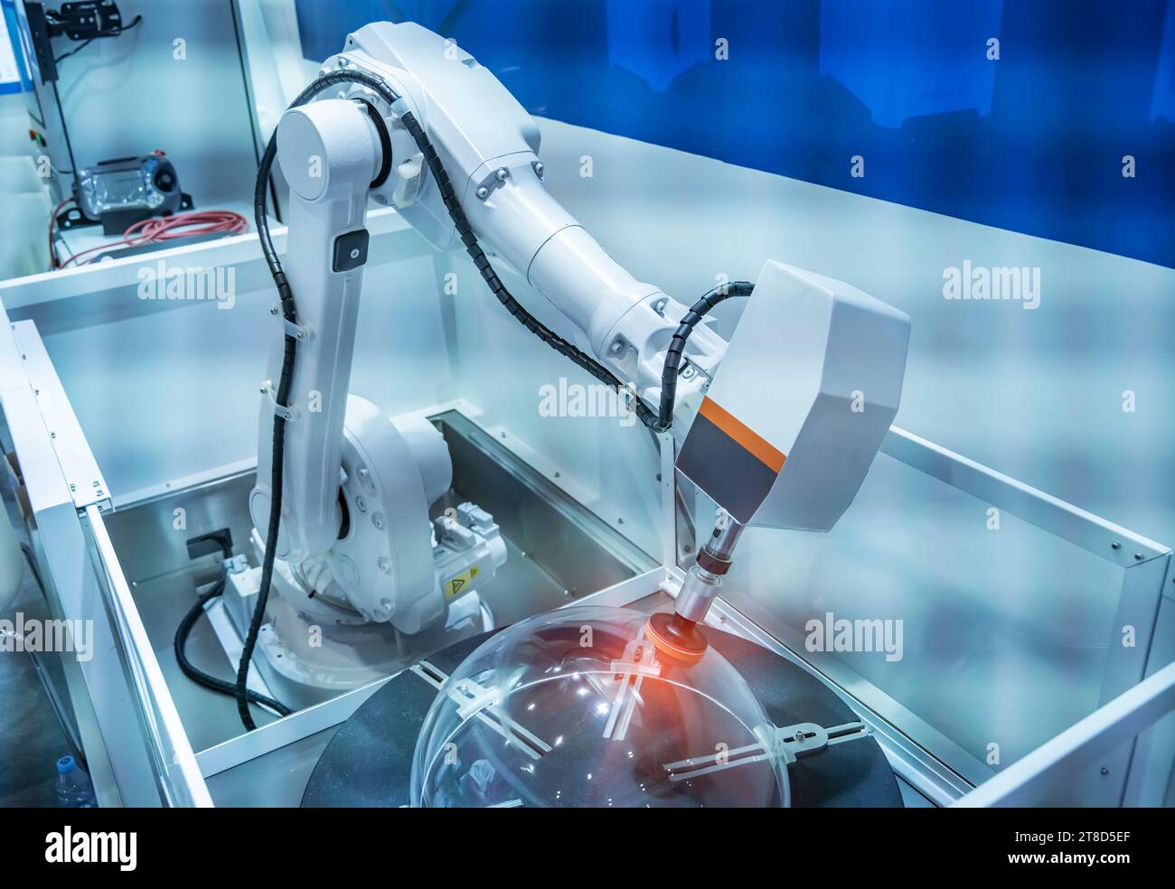 robot arm polishing the mobile phone part in the production line Stock ...