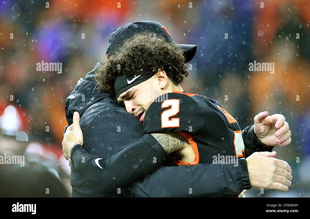 Oregon State head coach Jonathan Smith hugs senior wide receiver ...