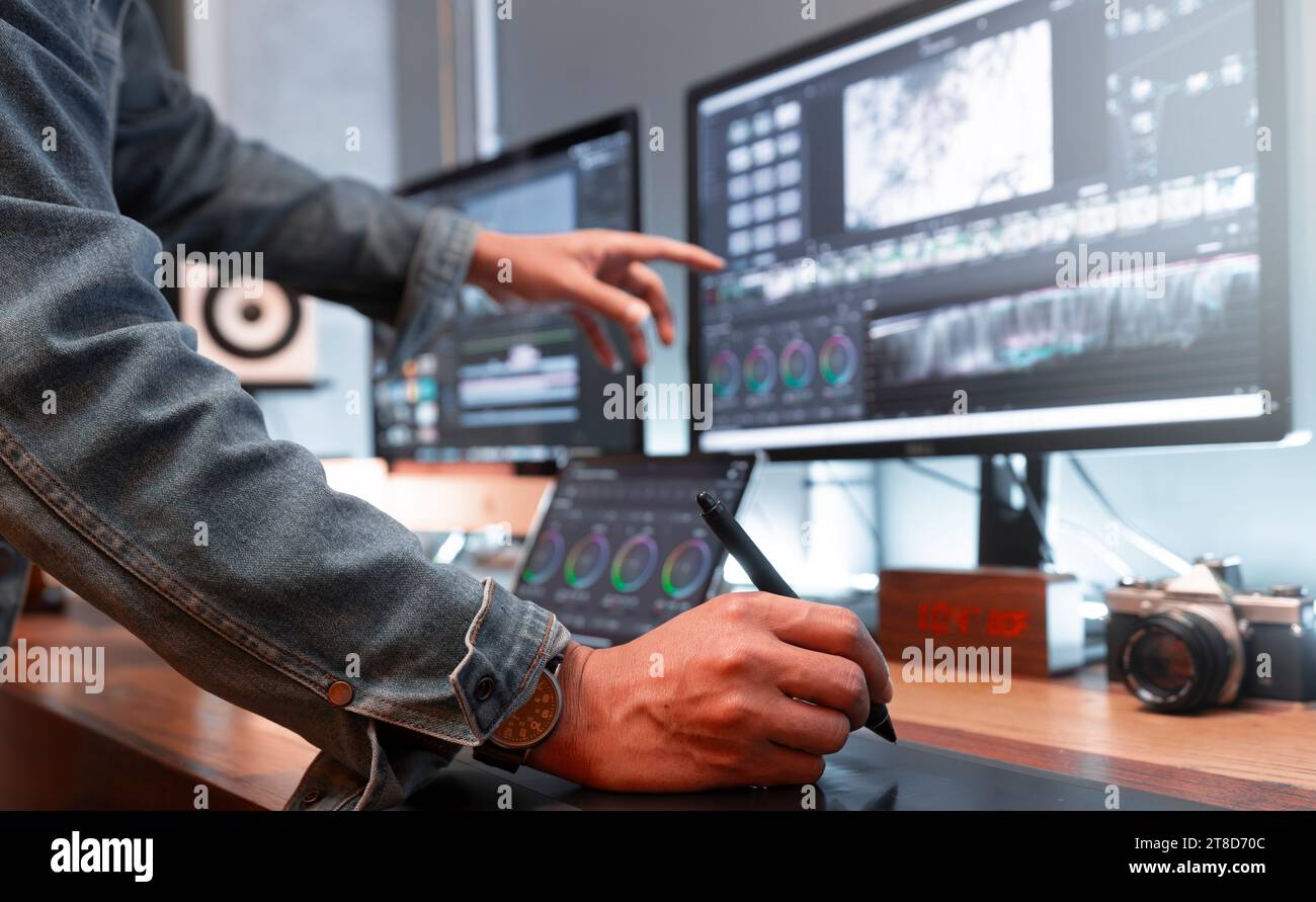 Asian filmmaker editing video audio hi-res stock photography and images ...