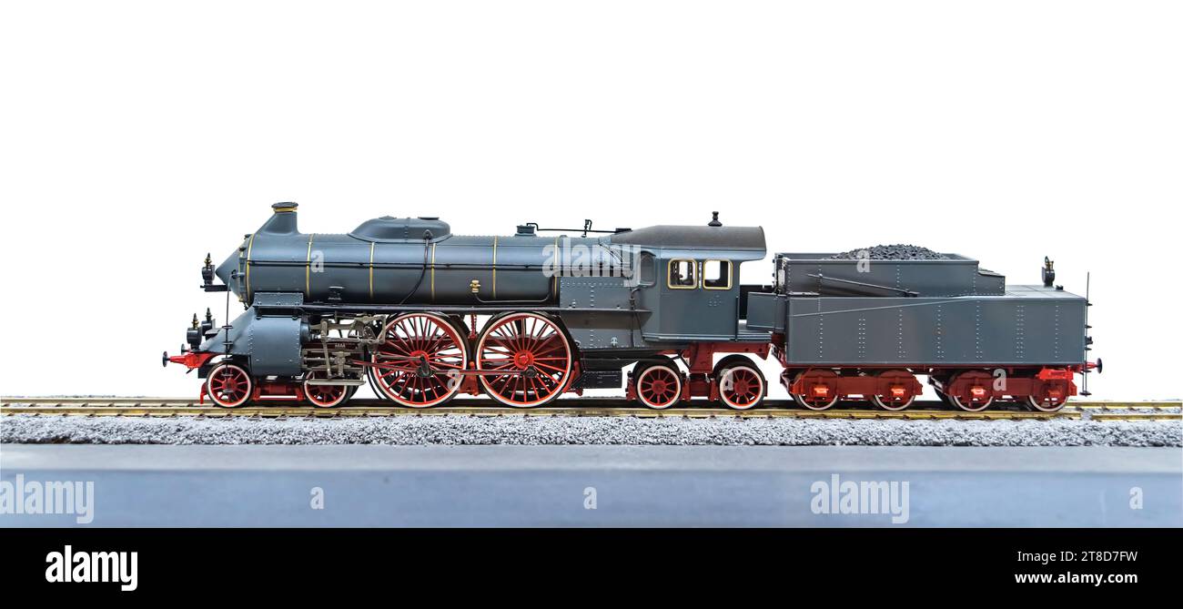 Antique model of old train locomotive isolated on white background ...