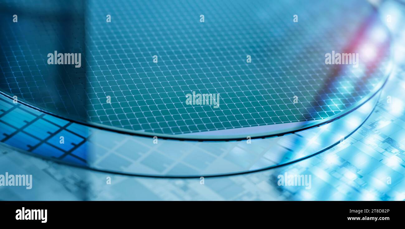 silicon chip wafer reflecting blue colors background Stock Photo - Alamy
